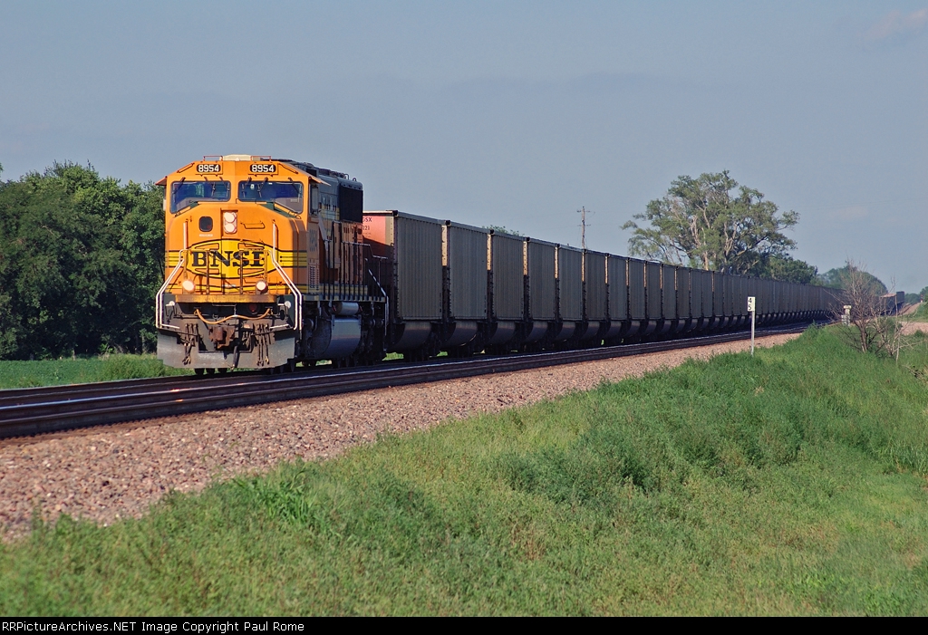 BNSF 8954, EMD SD70MAC, works coal empties westbound